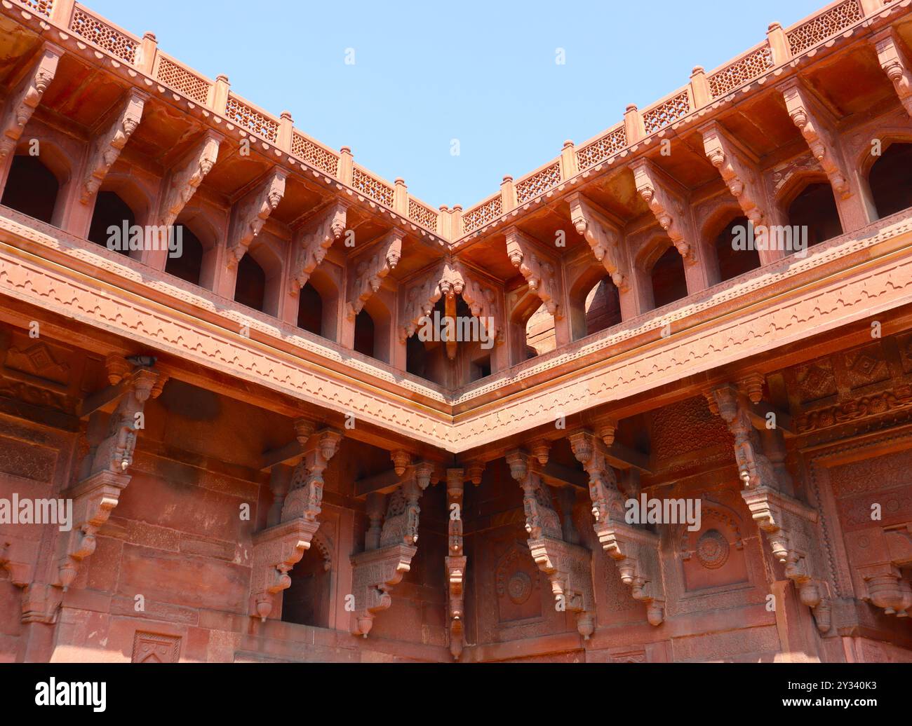 Exploring Agra Fort's red sandstone walls, alive with captivating ...