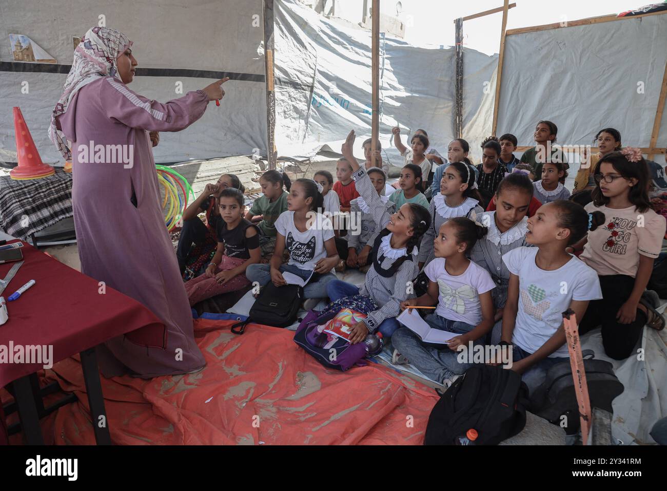 Gaza, Gaza, Palestine. 12th Sep, 2024. Palestinian teacher Israa Abu ...