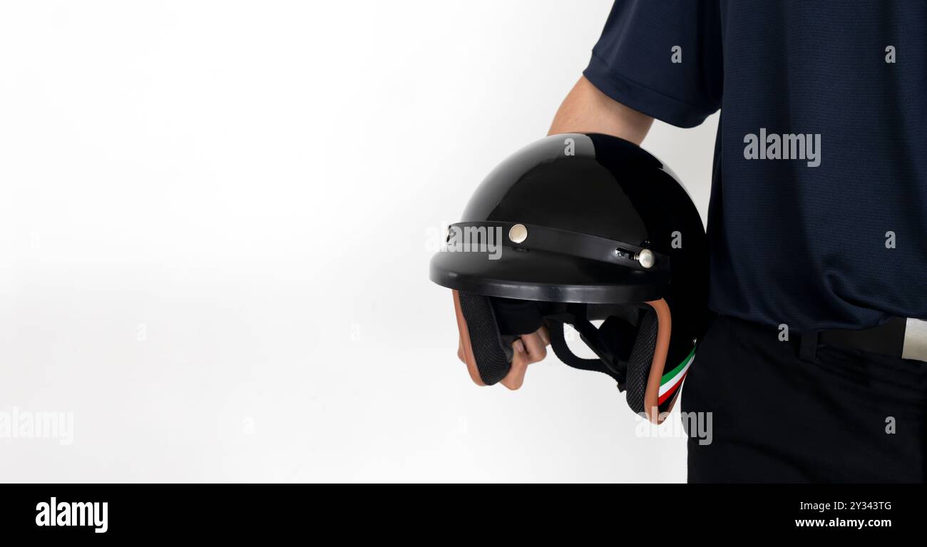 Man Holding Black Safety Helmet on White Background Stock Photo - Alamy