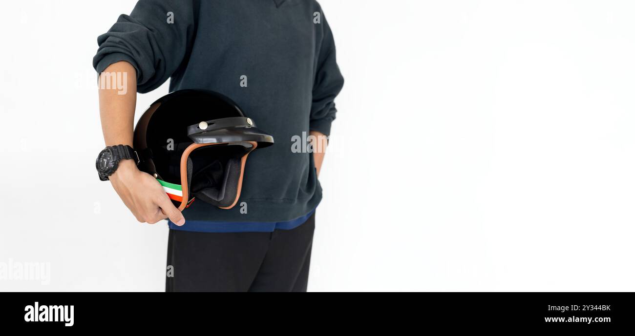 Man Holding Black Safety Helmet on White Background Stock Photo - Alamy