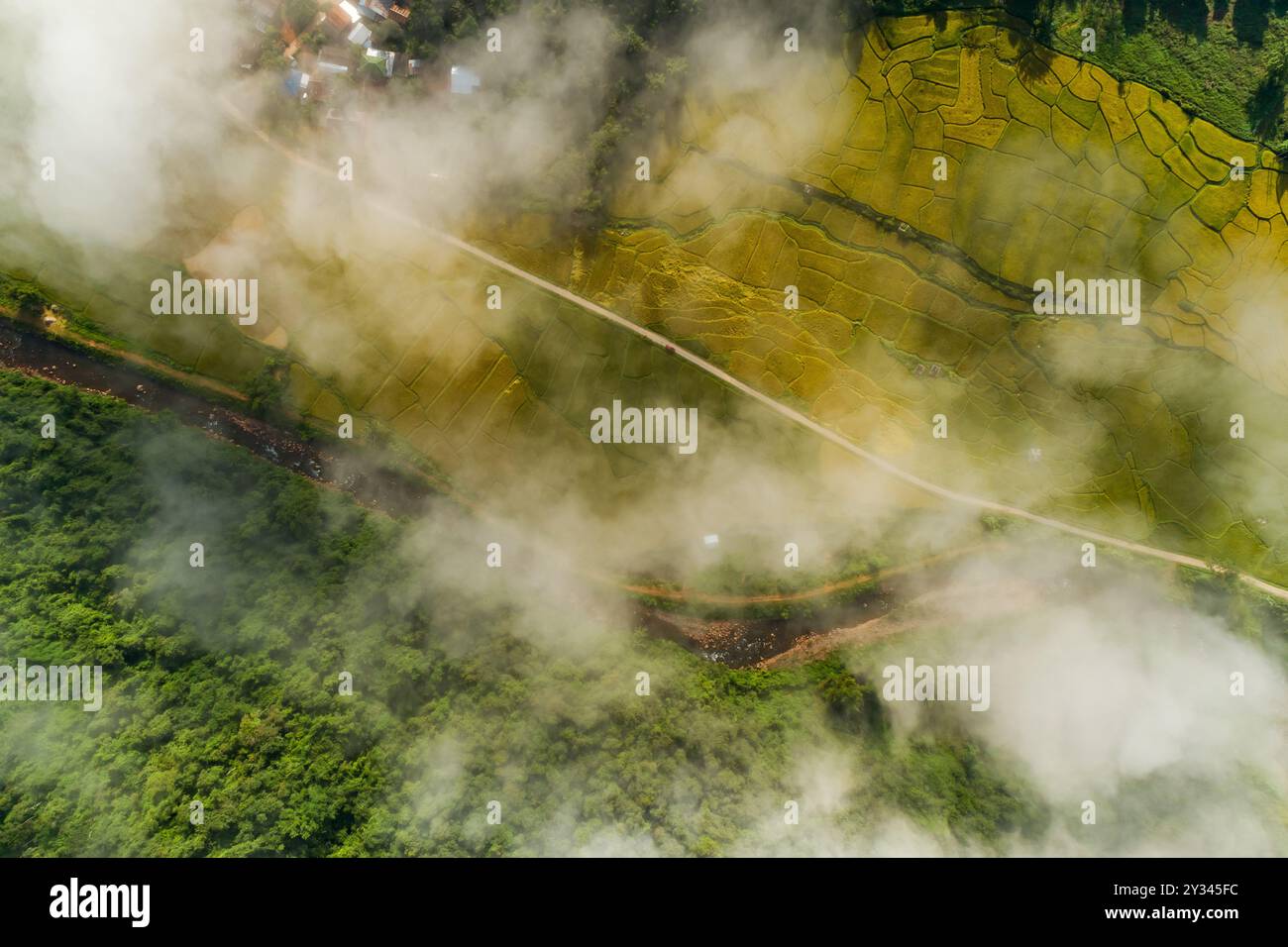 Aerial view drone shot of flowing fog waves on mountain tropical ...
