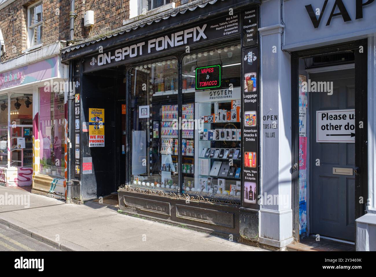 The storefront of the On-Spot Fonefix shop in central York, UK Stock ...