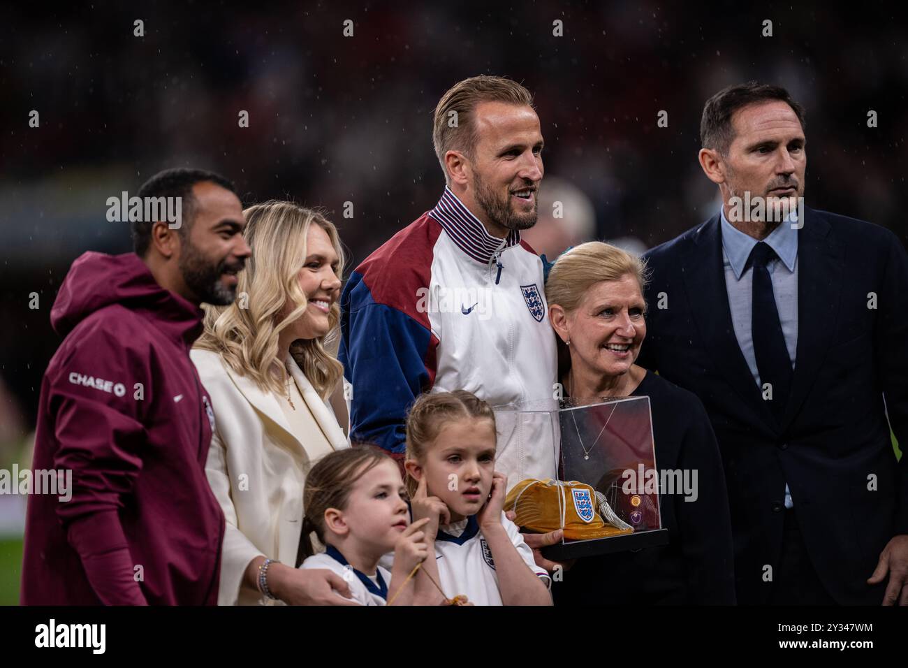 LONDON, ENGLAND - SEPTEMBER 10: Harry Kane of England receives his ...