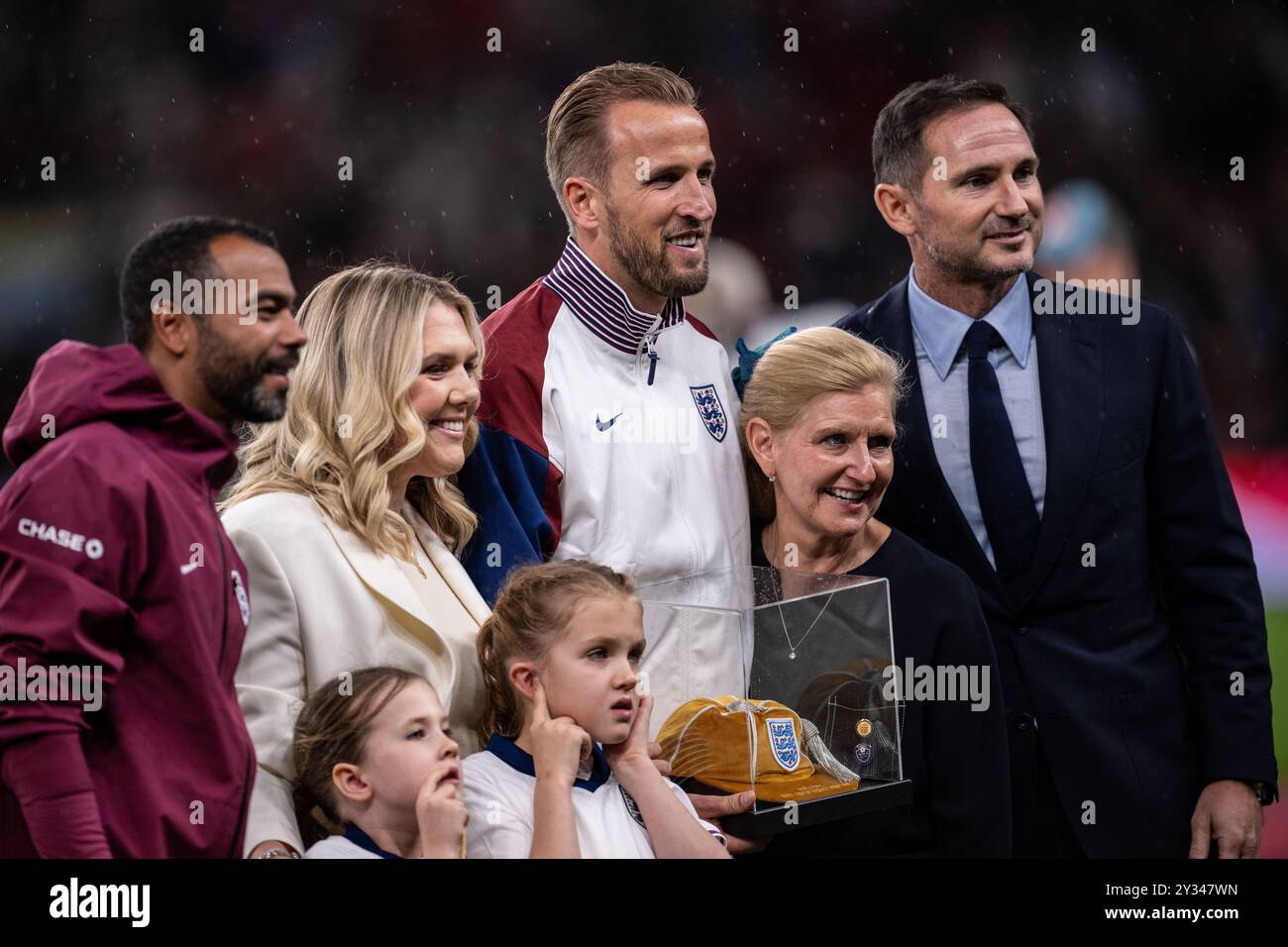LONDON, ENGLAND - SEPTEMBER 10: Harry Kane of England receives his ...