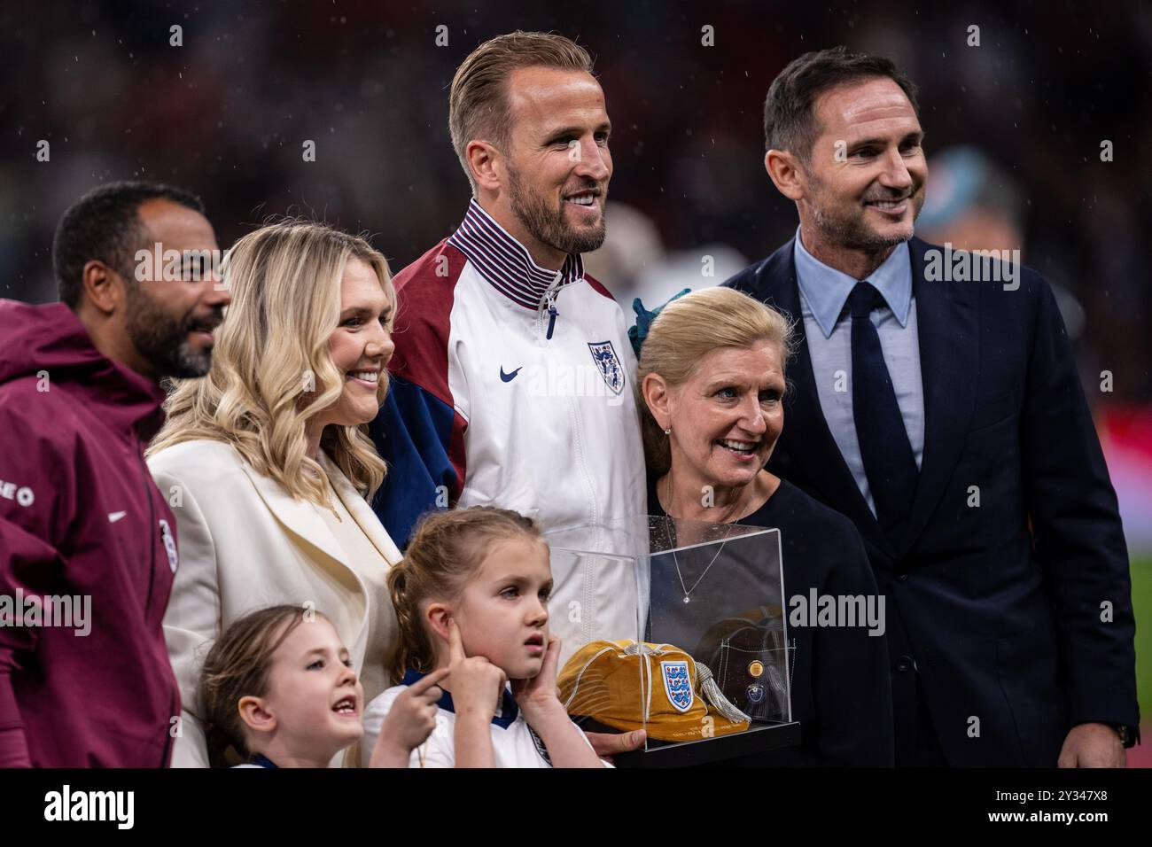 LONDON, ENGLAND - SEPTEMBER 10: Harry Kane of England receives his ...