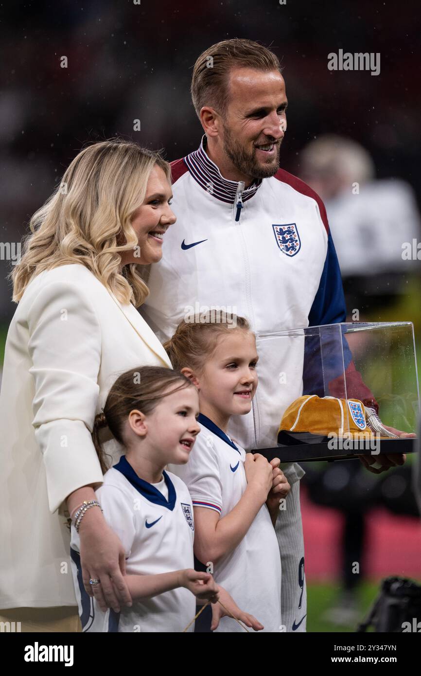 LONDON, ENGLAND - SEPTEMBER 10: Harry Kane of England receives his ...