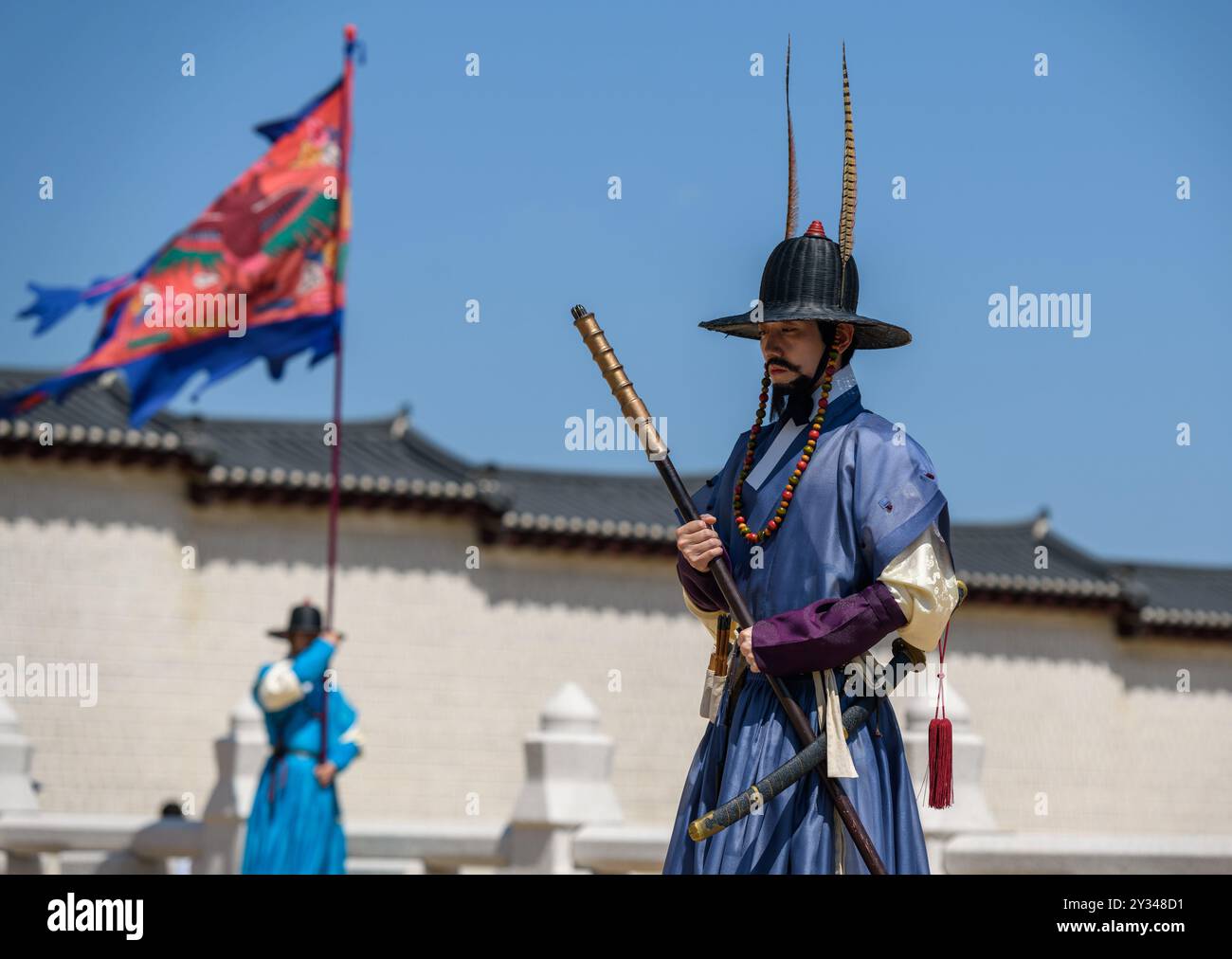 Guardians dressed in traditional Joseon Dynasty clothing guard ...