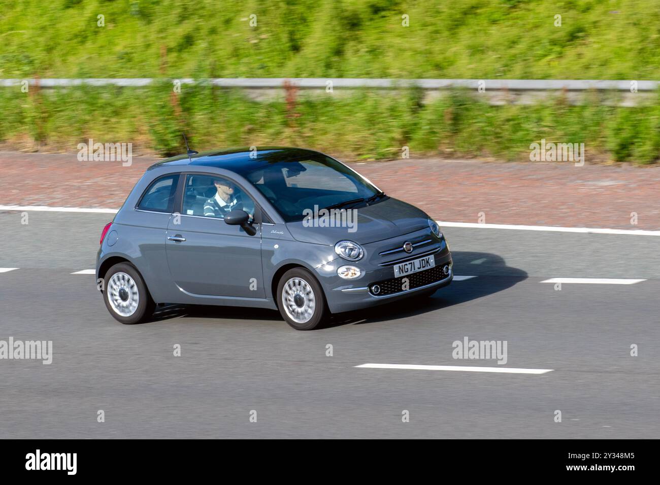 2022 Grey Fiat 500 Dolcevita Mhev; motoring on the M6 motorway ...