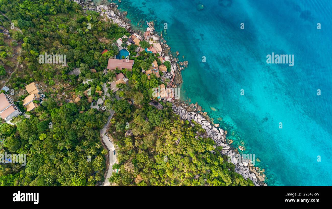 Aerial view drone uav top down birds eye view blue water and coral reef ...