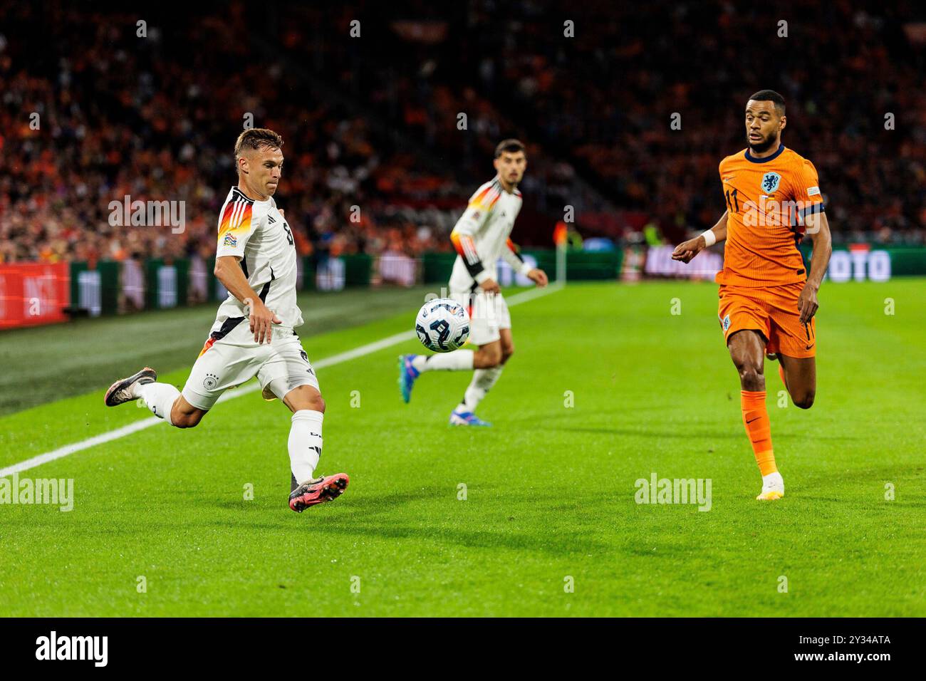 Zweikampf Joshua Kimmich (Deutschland, 6), Cody Gakpo (Niederlande, 11) UEFA Nations League 2024 ...