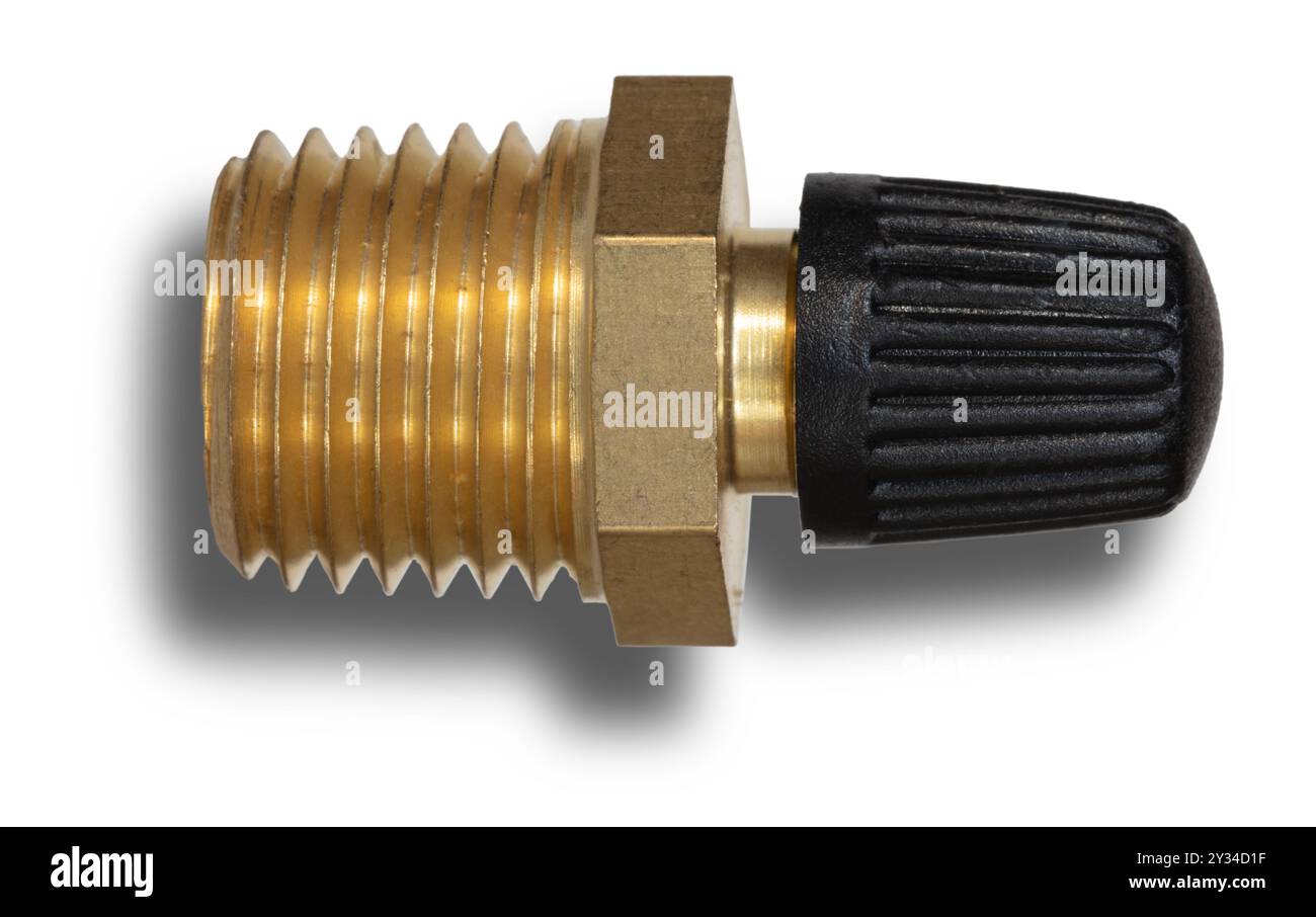 Isolated brass air fitting for work with black cap threaded on to ...