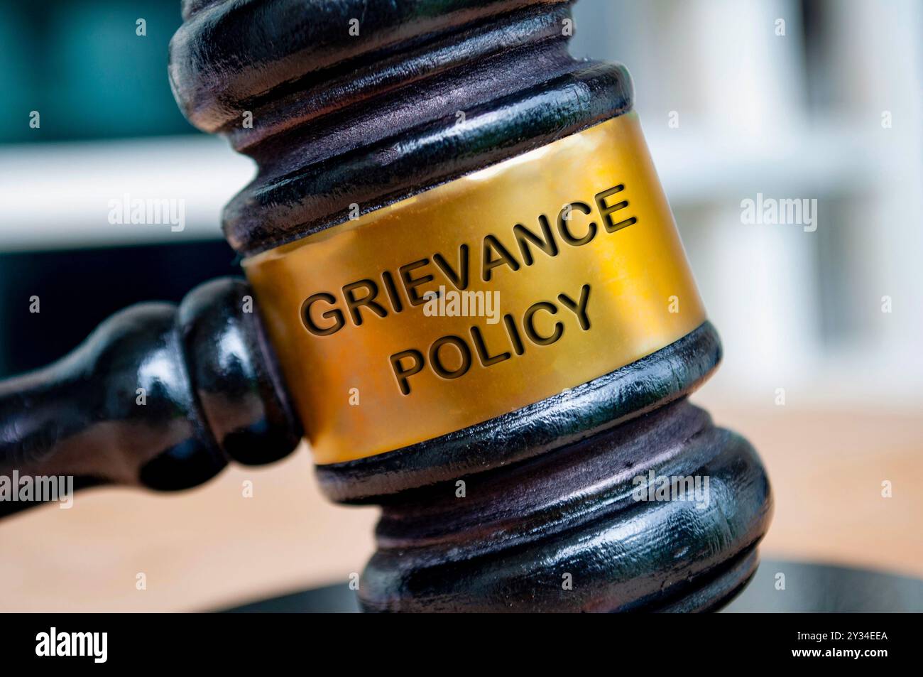 Grievance policy text engraved on gavel. Grievance policy concept Stock ...