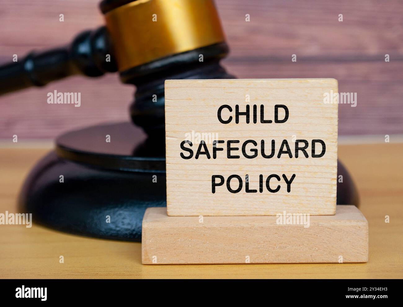 Child Safeguard Policy text on wooden blocks with gavel background ...