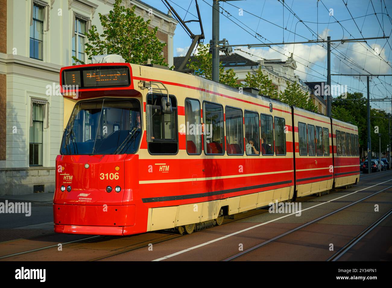 A moving Number 1 red HTM tram at Delft, The Netherlands Stock Photo ...