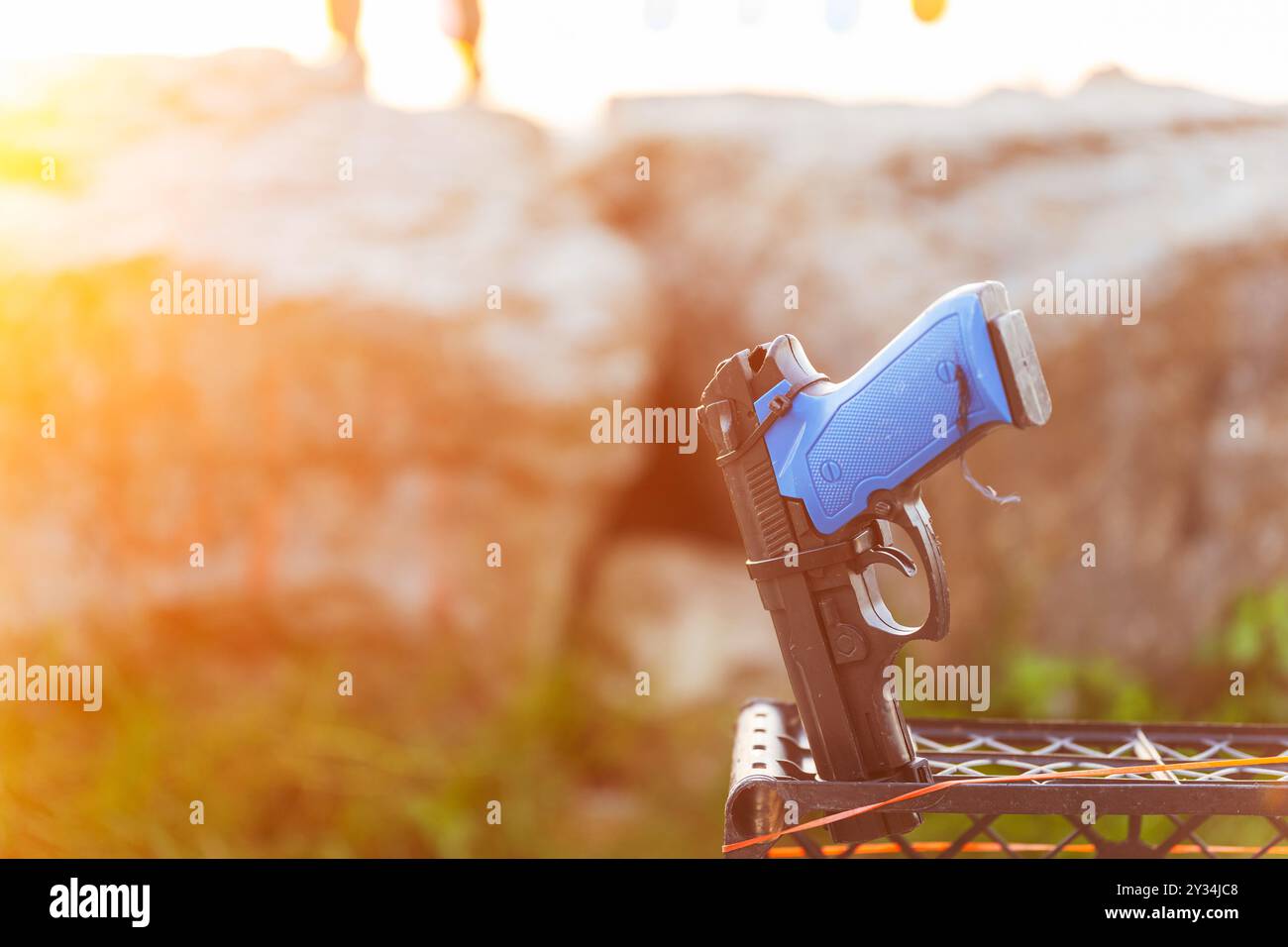 Fake gun on a plastic black box Stock Photo - Alamy