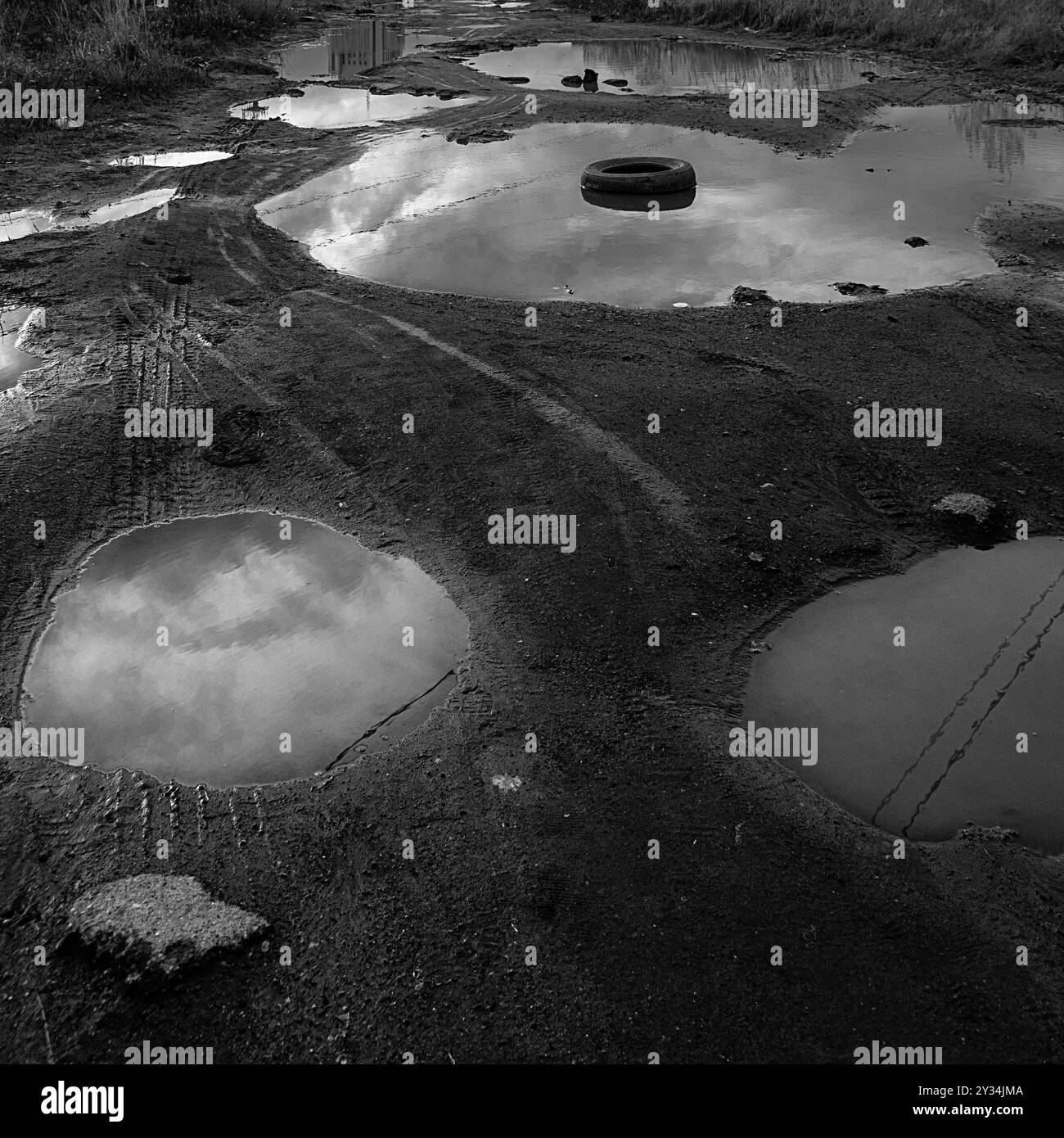 Huge puddle of rain water Black and White Stock Photos & Images - Alamy