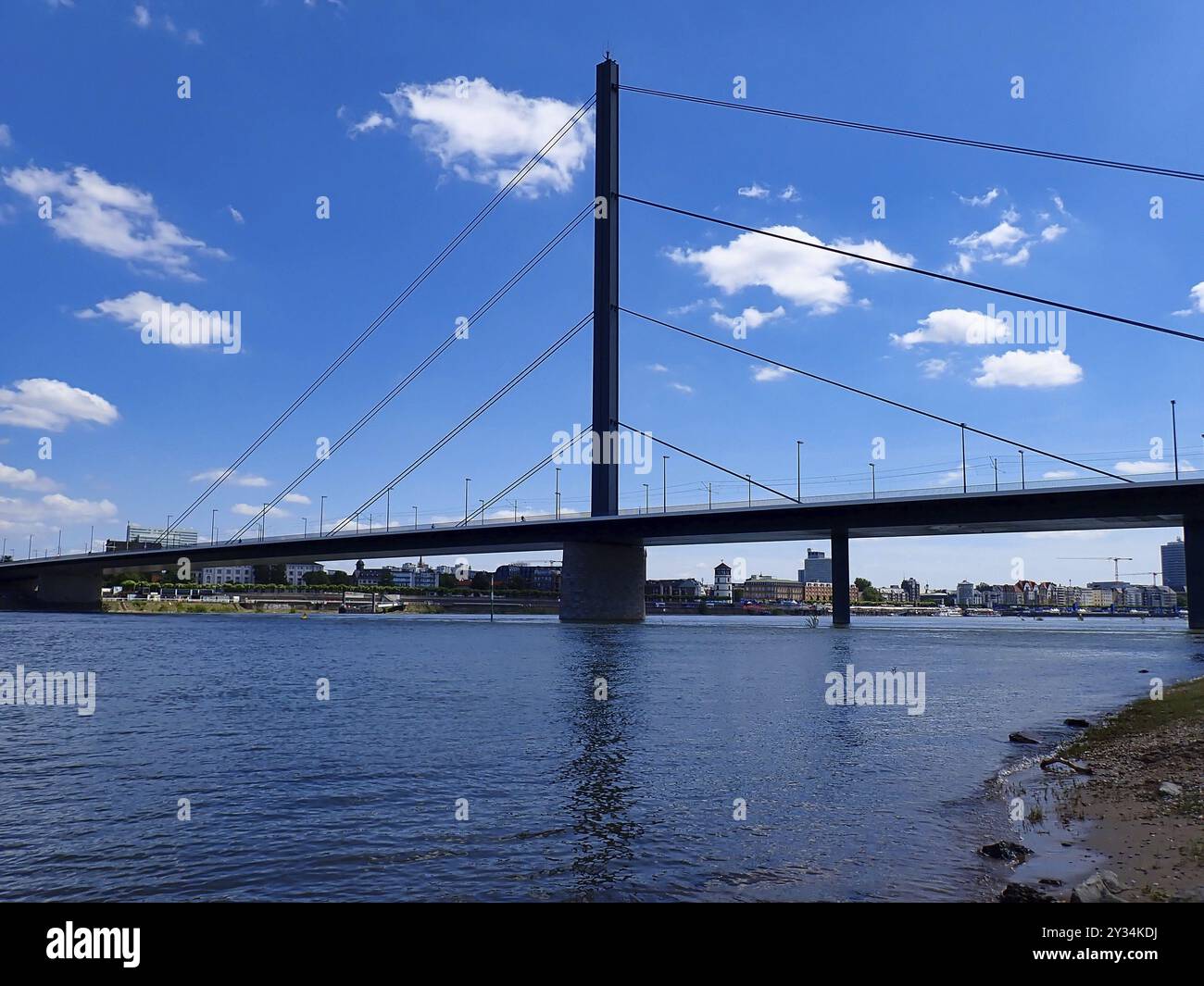 View over the Rhine, with the Rheinknie Bridge behind it, Duesseldorf ...