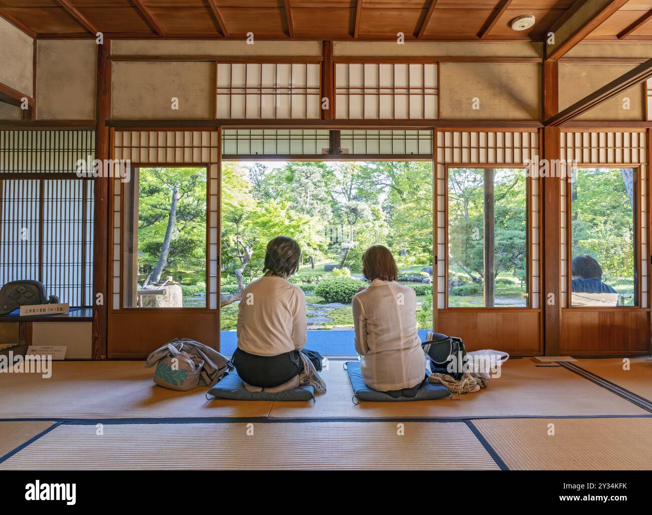 Two women enjoy tea inside the Old Mitsui Family Shimogamo Villa, Kyoto ...