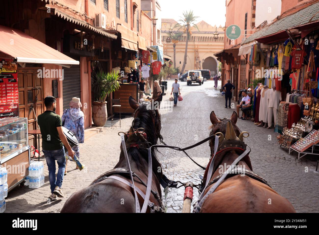 Horse-drawn carriages are used to tour the city of Marrakech, a tourist ...