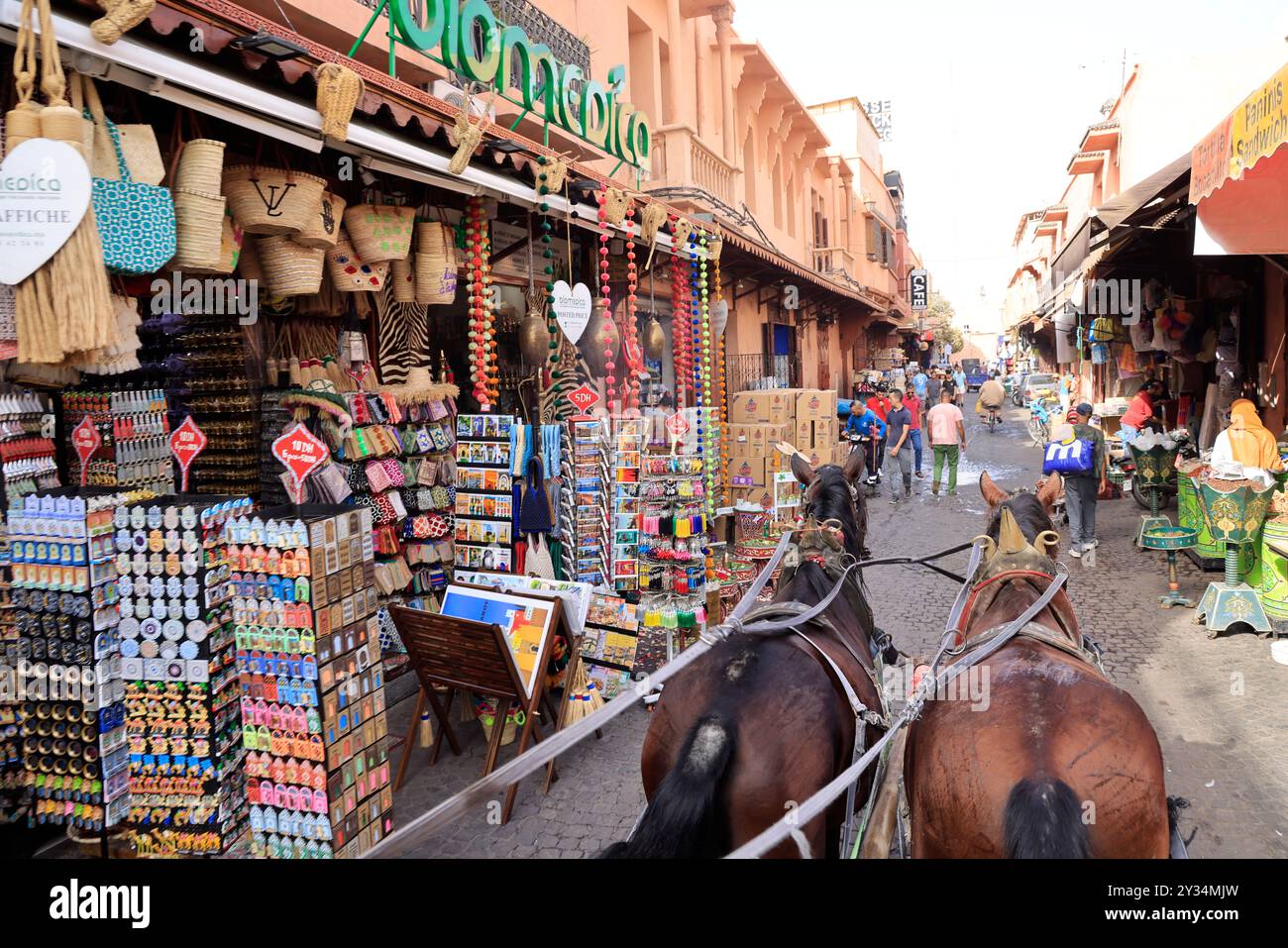Horse-drawn carriages are used to tour the city of Marrakech, a tourist ...
