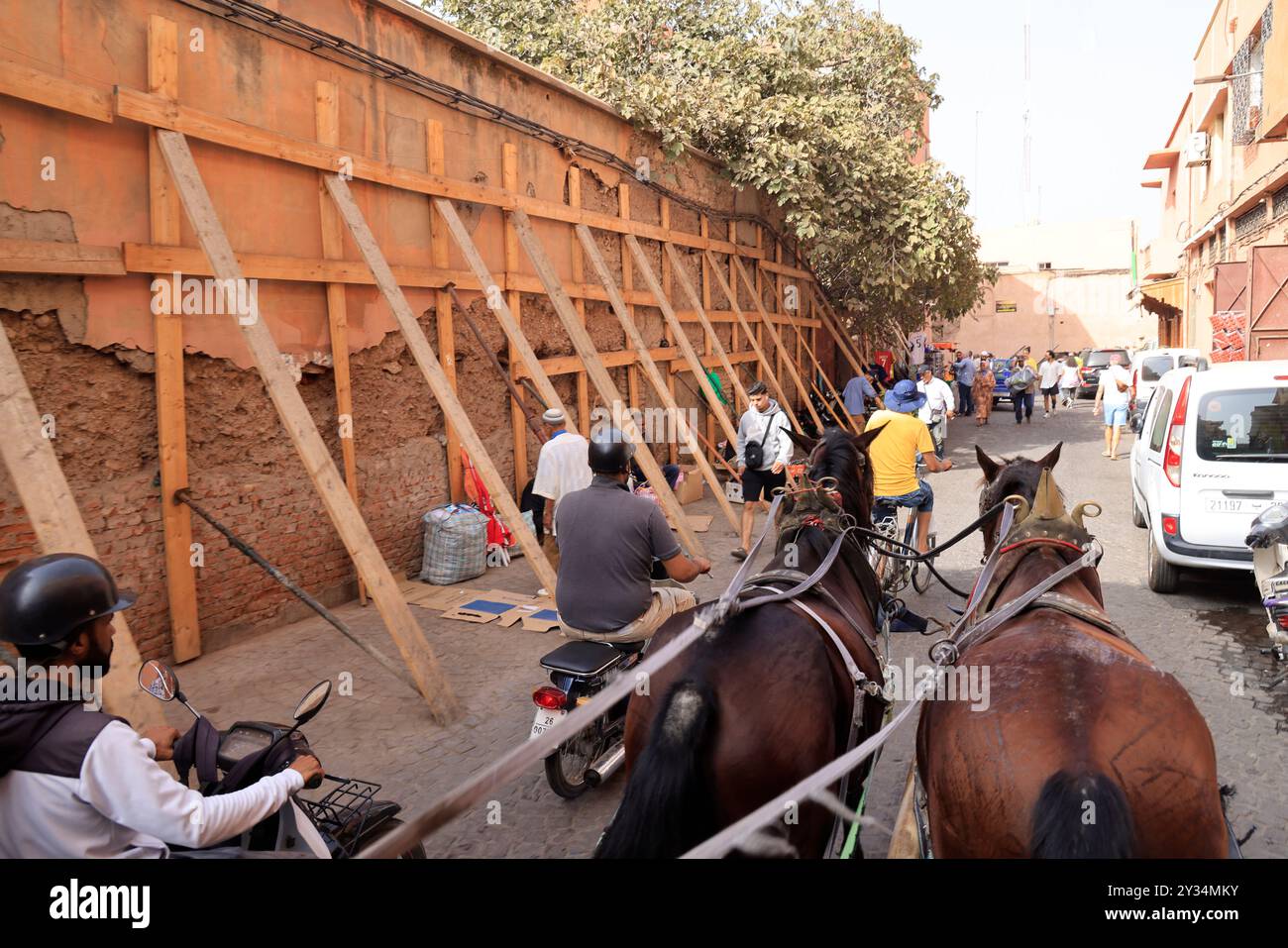 Horse-drawn carriages are used to tour the city of Marrakech, a tourist ...