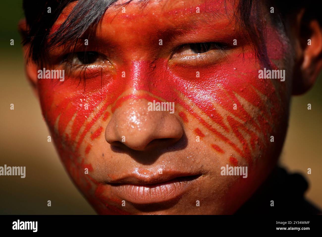 Indigenous youth Yawari Asheninka poses for a picture next to the ...