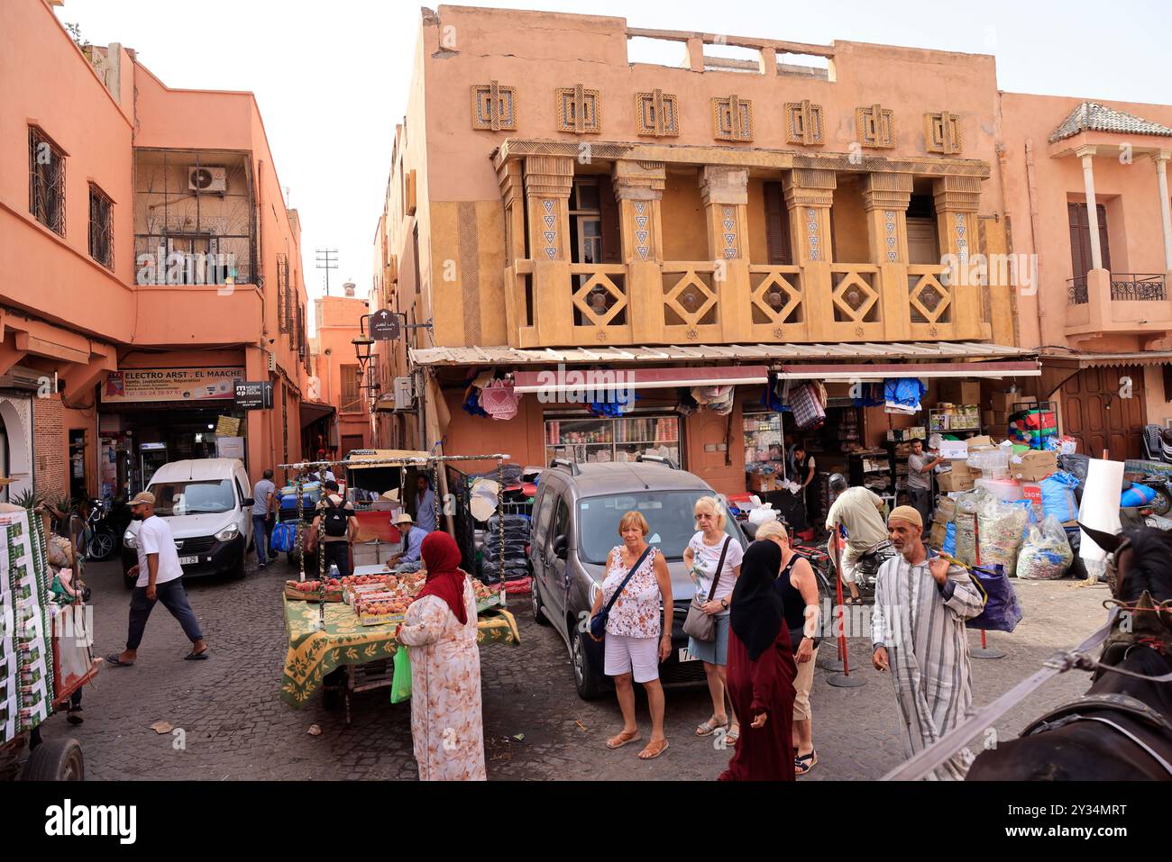 Horse-drawn carriages are used to tour the city of Marrakech, a tourist ...