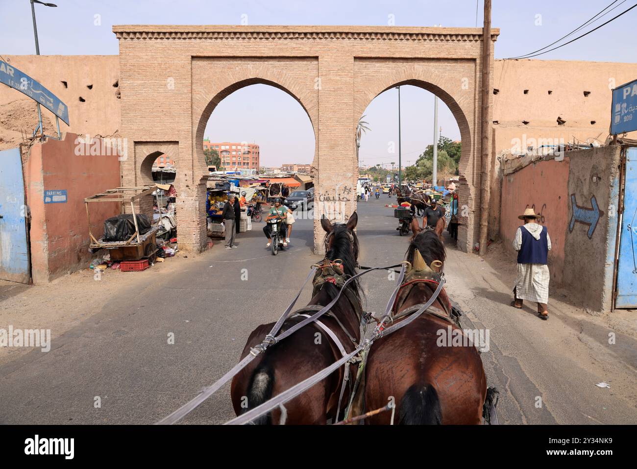 Horse-drawn carriages are used to tour the city of Marrakech, a tourist ...
