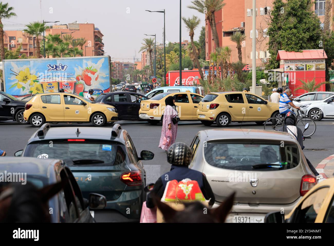 Horse-drawn carriages are used to tour the city of Marrakech, a tourist ...