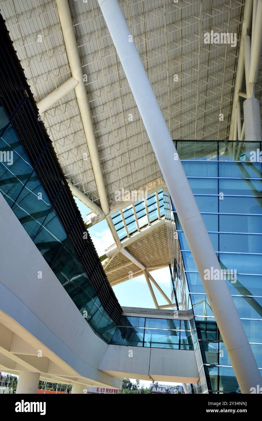 a striking architectural design featuring a modern glass and steel ...