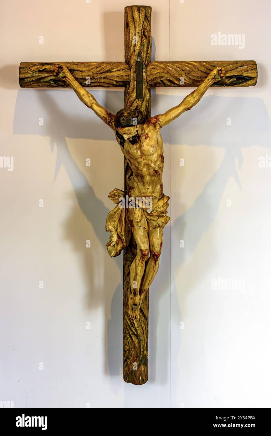 18th century baroque sculpture depicting the crucified Christ in Olinda, Brazil, South America ...