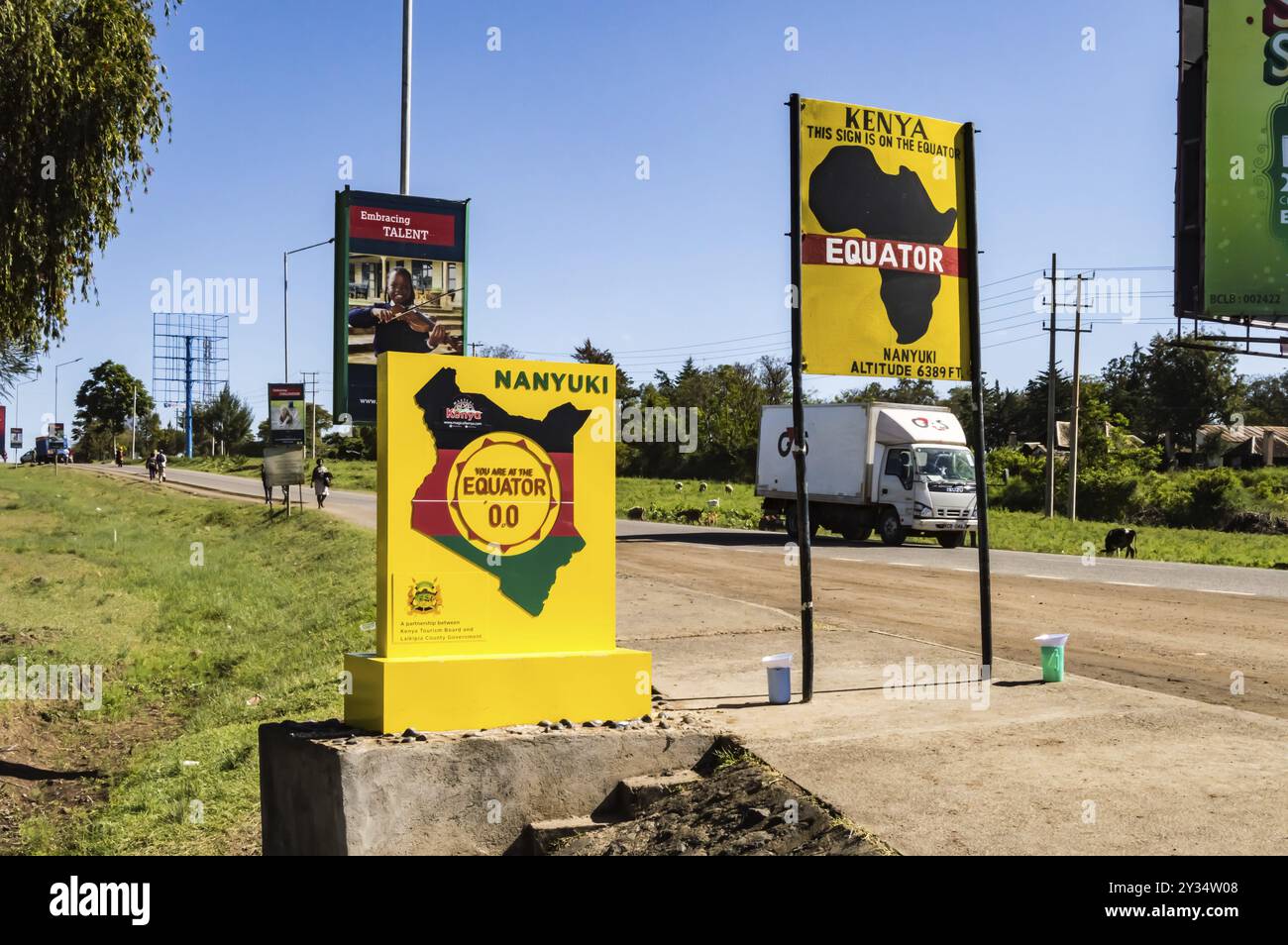 Equator line road sign in Nanyuki city in central Kenya Stock Photo - Alamy