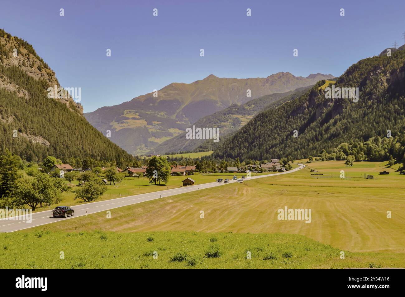 Austrian countryside and mountains under the sun Stock Photo - Alamy