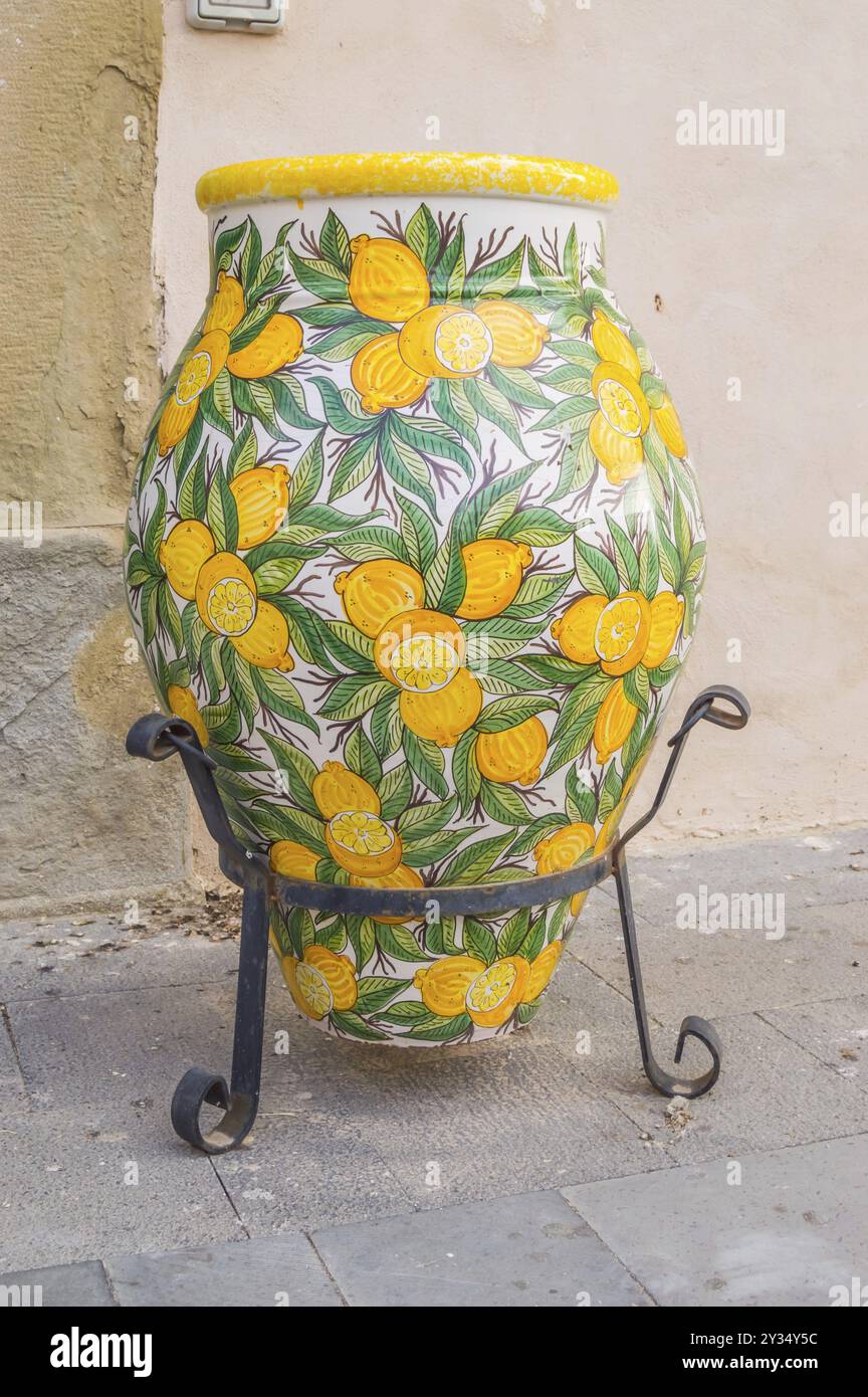 Ceramic jar decorated with lemons on a foot in the city of Santo ...