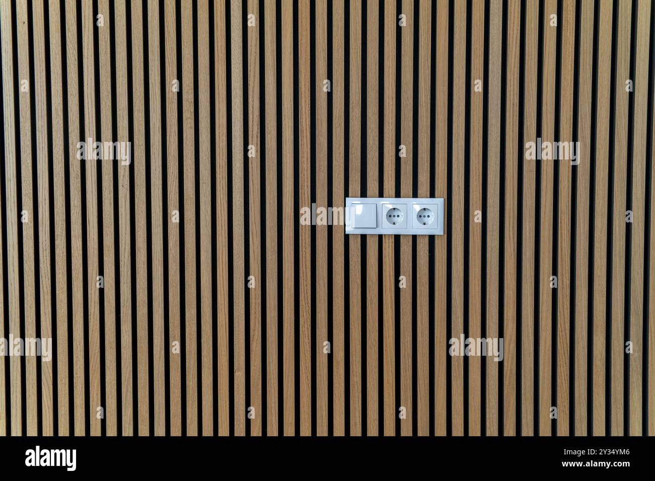 Light switch on wooden wall texture with sound absorbing and soundproof ...