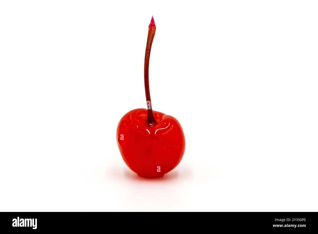 Candied cherries very red with its stem on a white background Stock ...