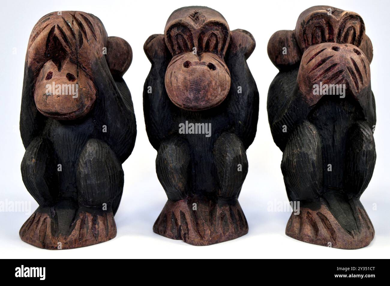 Three wooden monkeys who does not hear, does not see and keep silent about it Stock Photo - Alamy