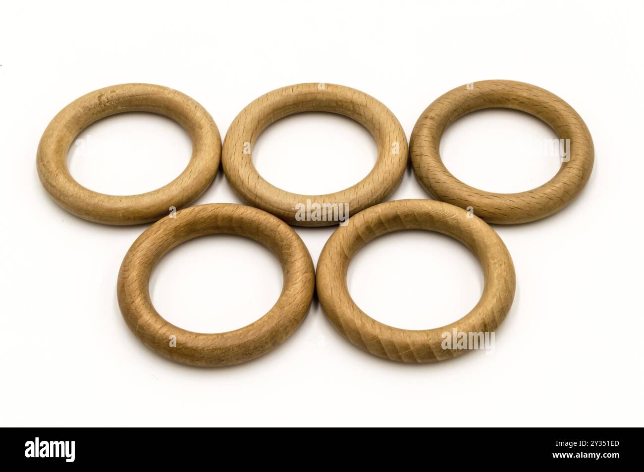 Olympic ring in wooden circle on a white background Stock Photo - Alamy