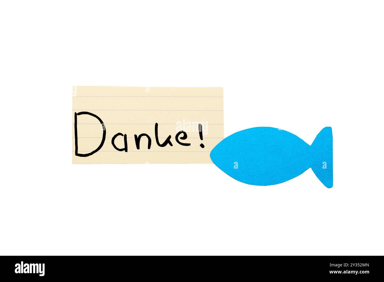Danke! German word handwritten on a beige paper. Blue fish in the ...