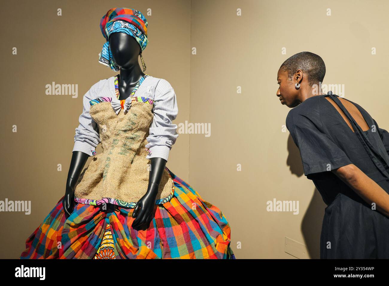 London, UK. 12th Sep, 2024. Museum staffer Kimberley with 'Queen Joyce ...