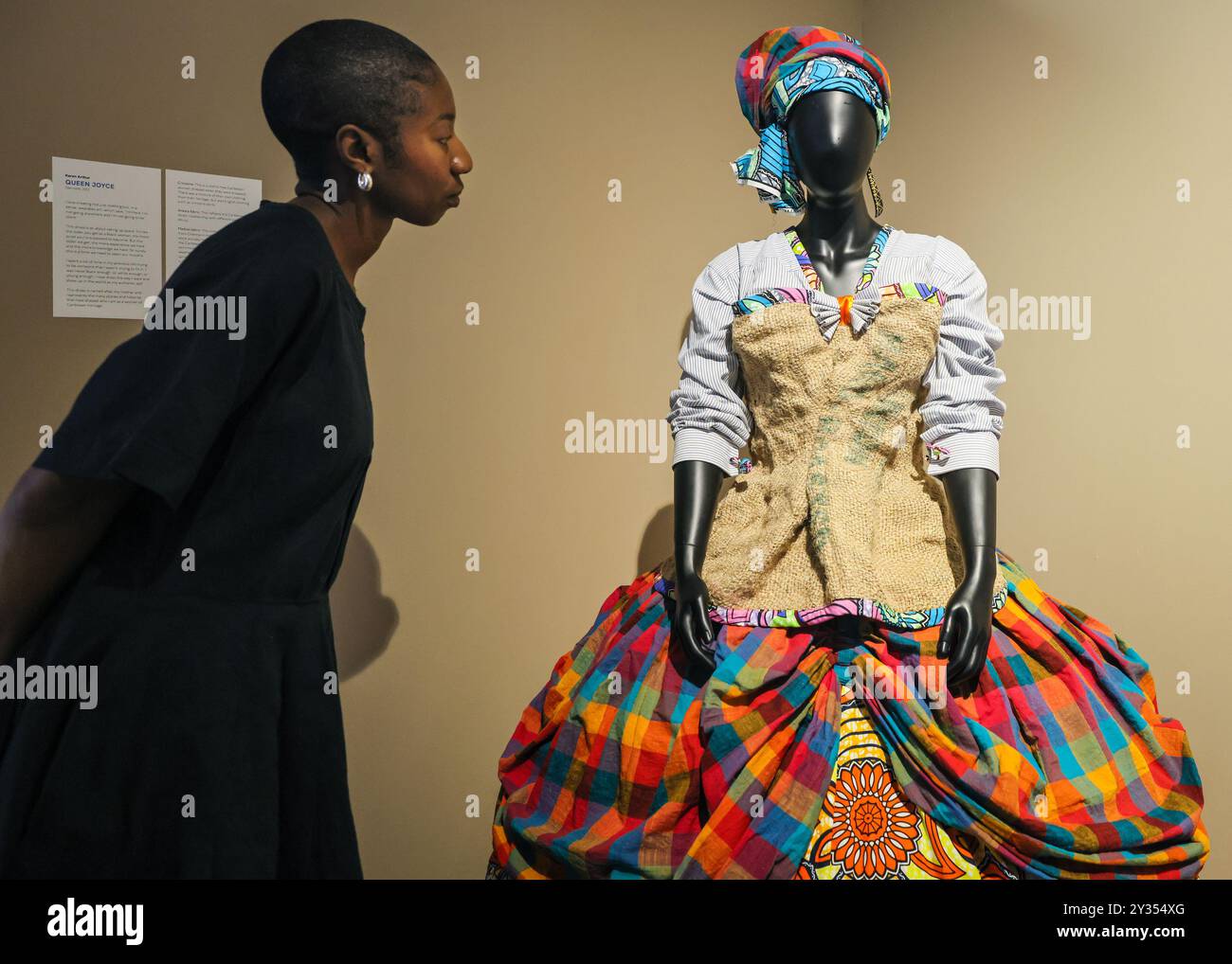 London, UK. 12th Sep, 2024. Museum staffer Kimberley with 'Queen Joyce ...