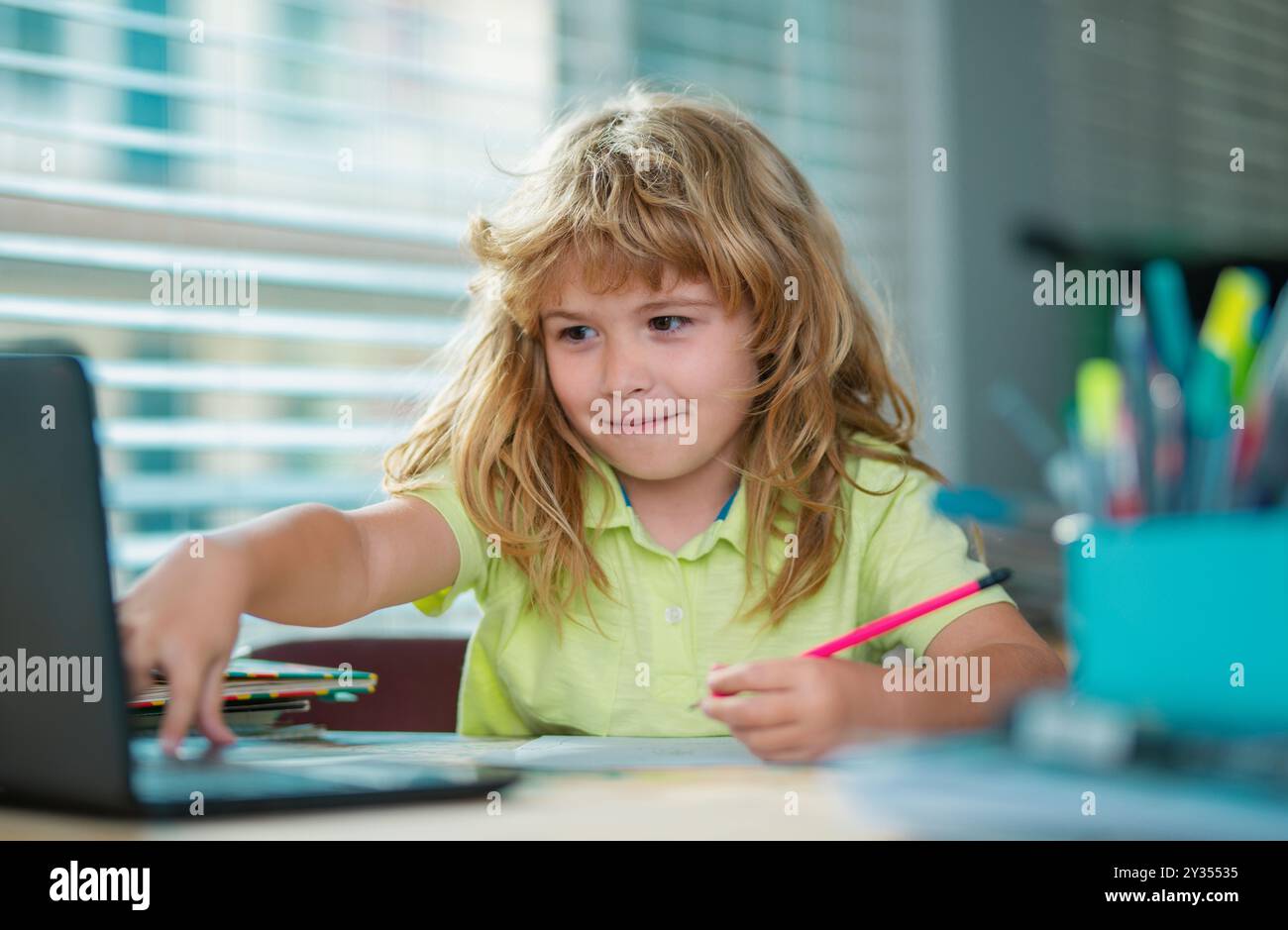 Genius nerd pupil child has idea. Child writing at school. School boy ...