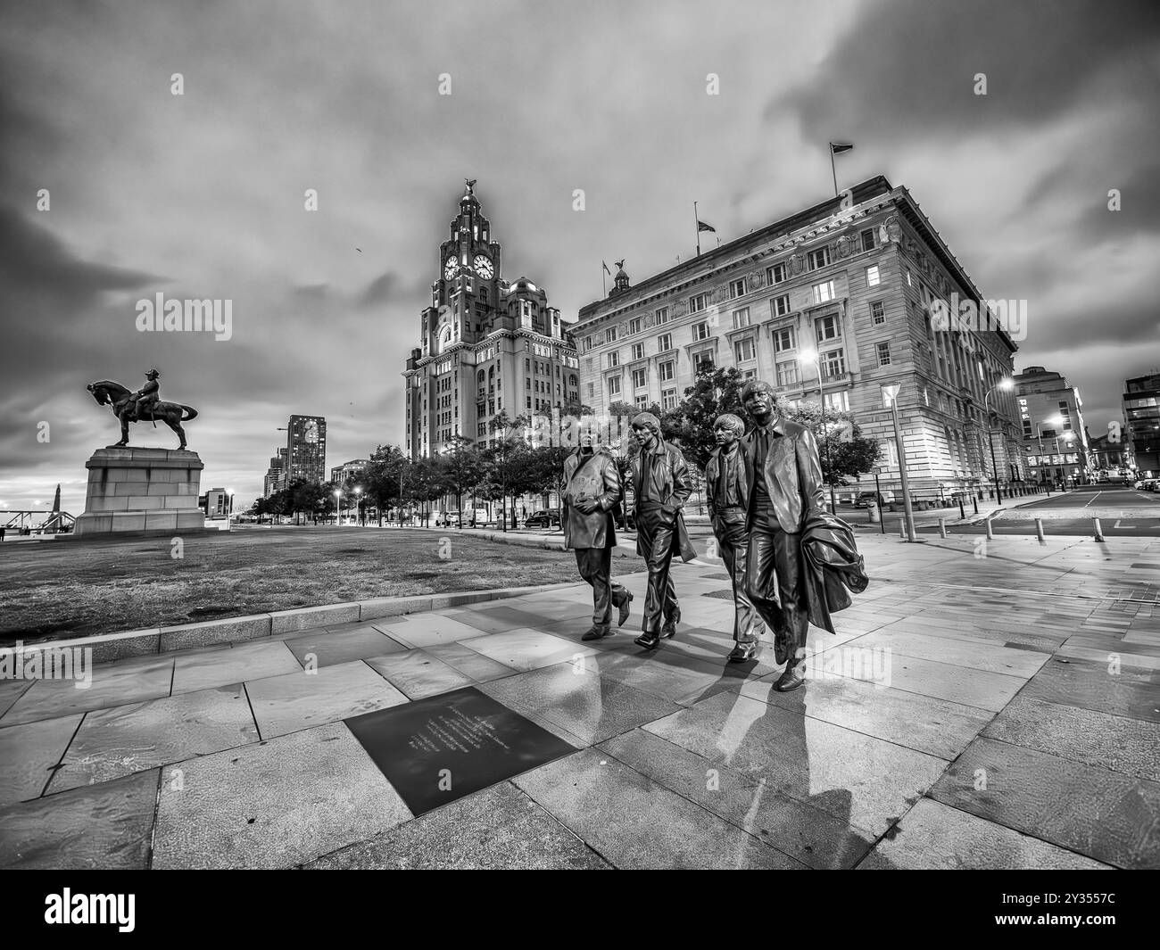 This image is the statue of the Liverpool music group the Beatles who ...