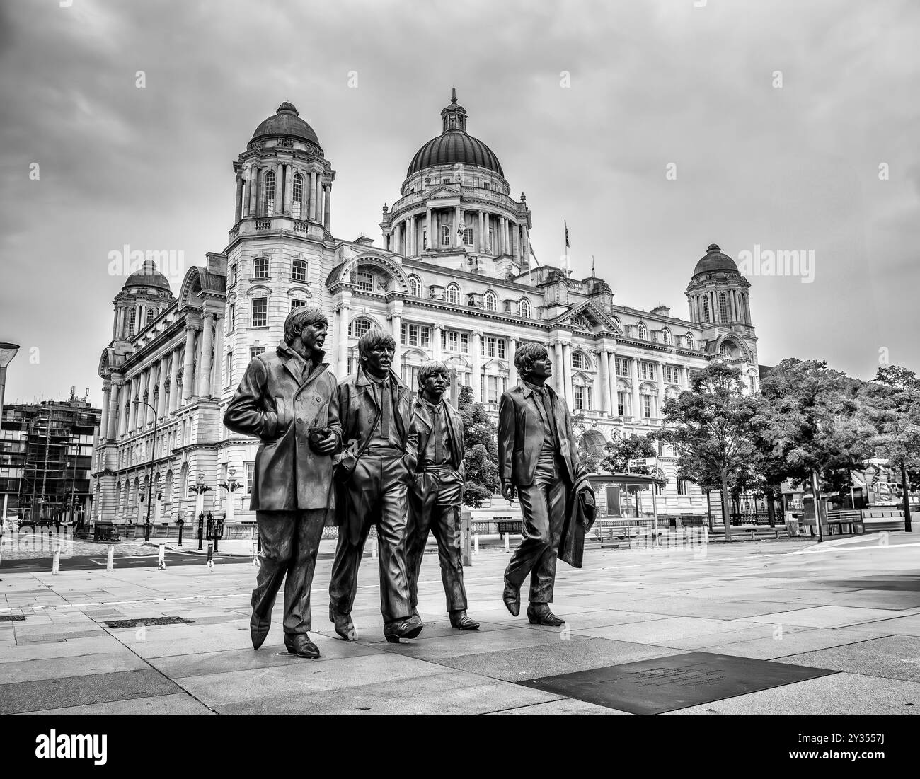 This image is the statue of the Liverpool music group the Beatles who ...