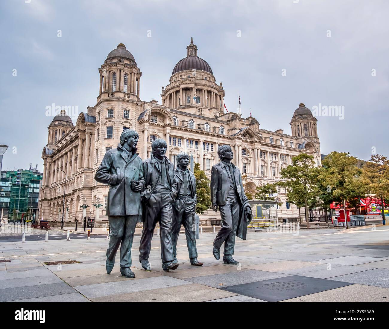 This image is the statue of the Liverpool music group the Beatles who ...