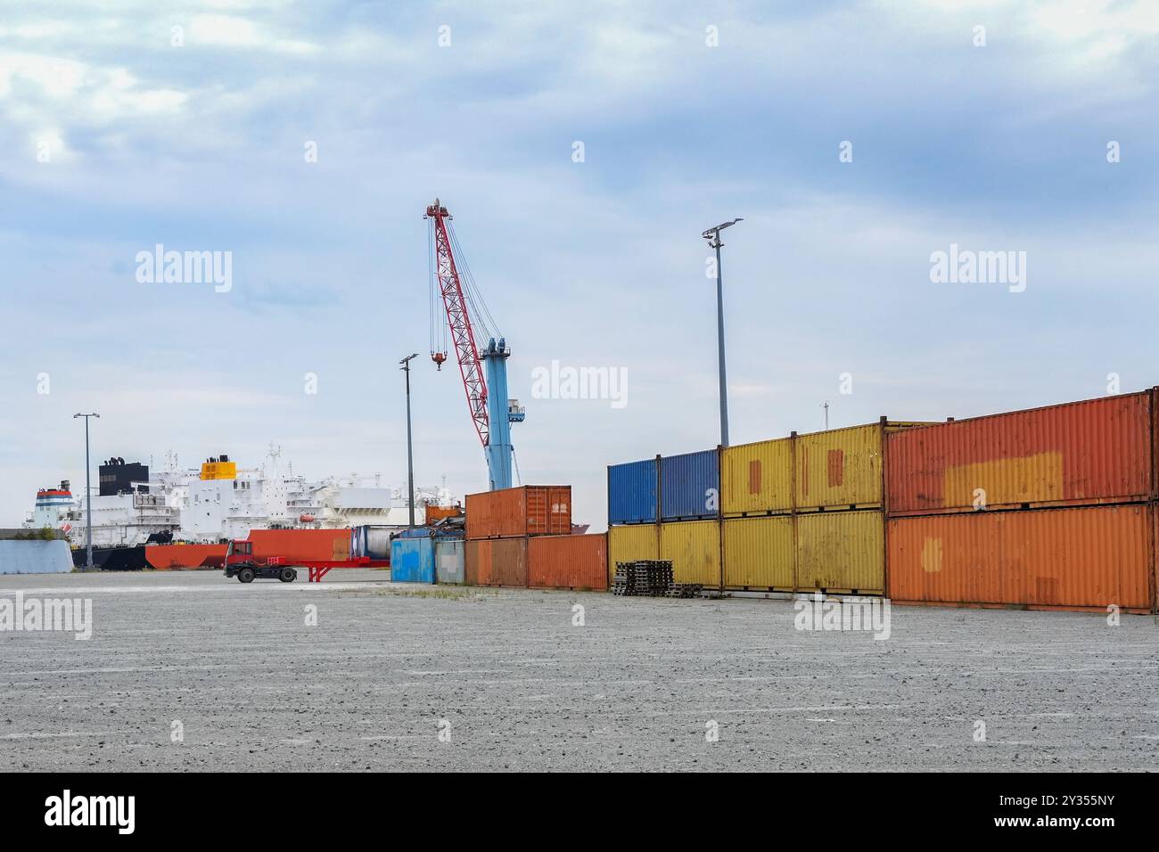 Freight container, crane and a ship at the industry cargo port of ...