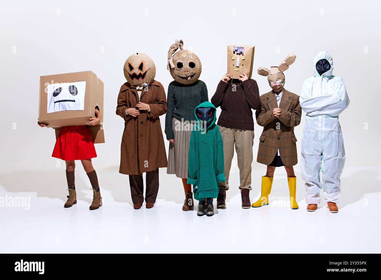 Group of people, family and friends wearing creepy homemade costumes ...