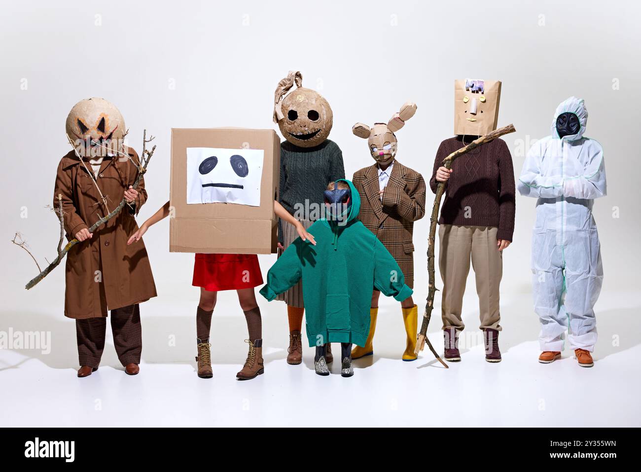 Group of people, family and friends wearing creepy homemade costumes ...