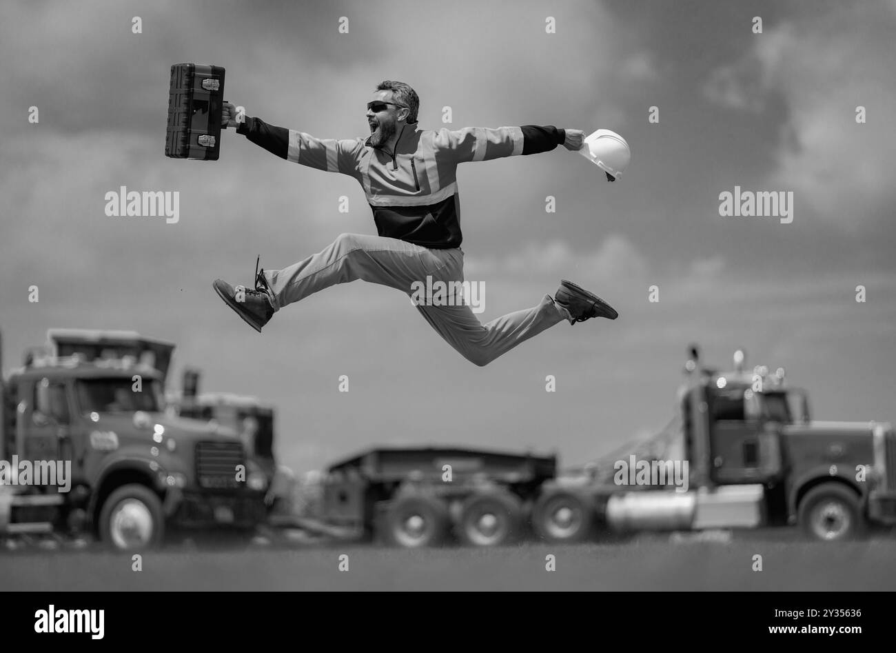 Hispanic 40 s builder excited jump on site construction. Excited ...