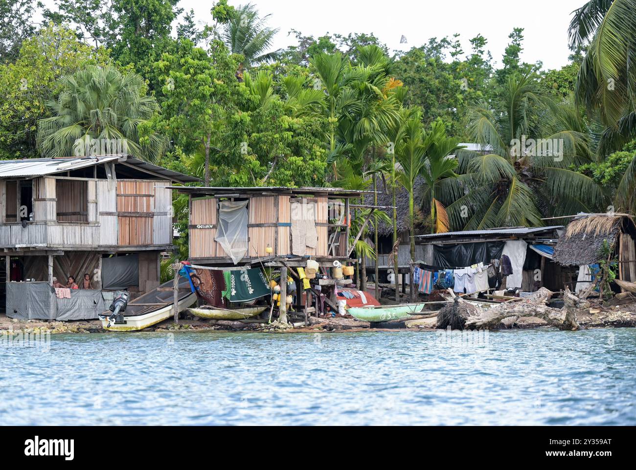 PAPUA NEW GUINEA, Madang, fishing village Riwo at sea coast, affected ...